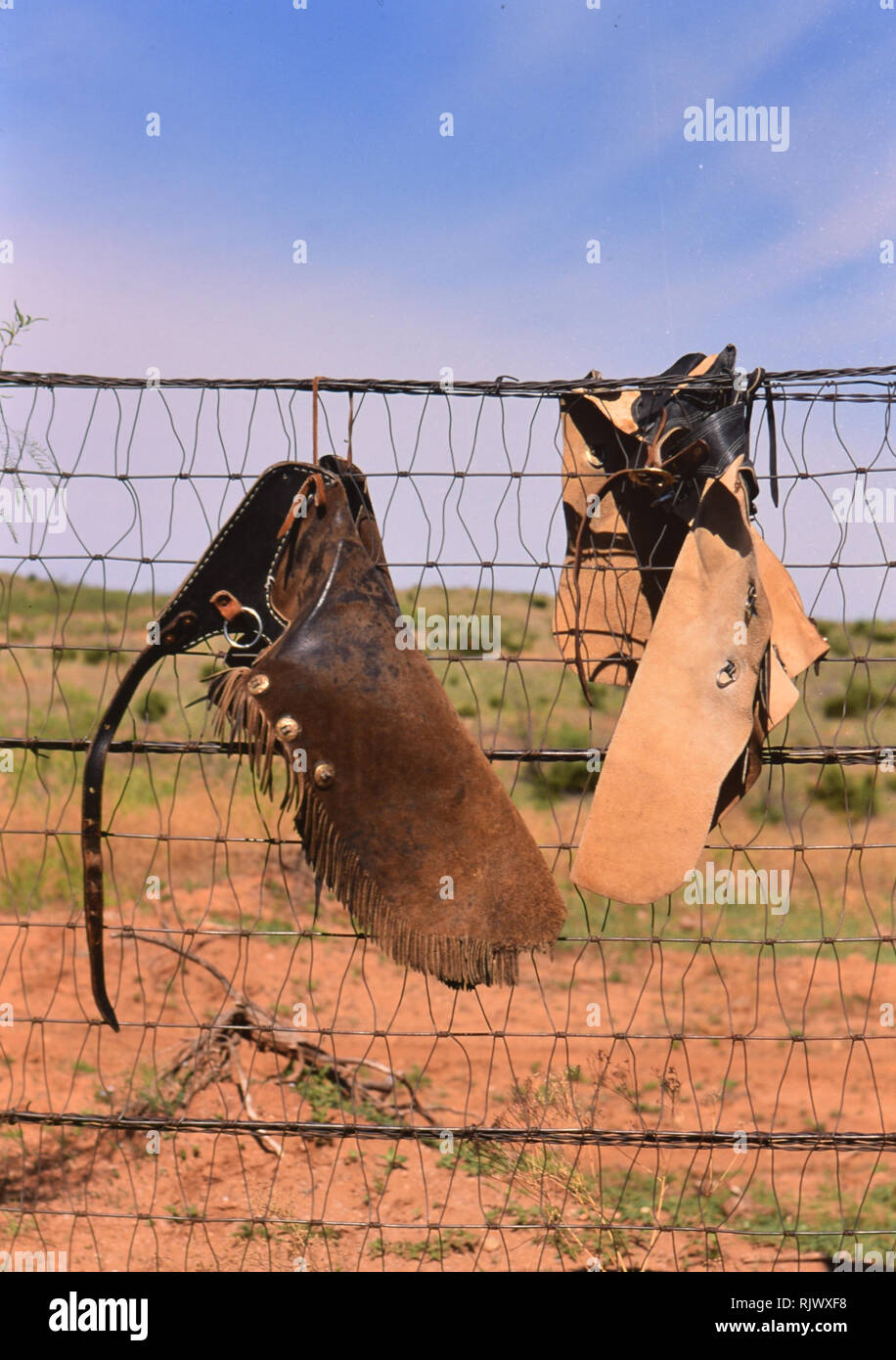 Chaps hanging on fence hi-res stock photography and images - Alamy