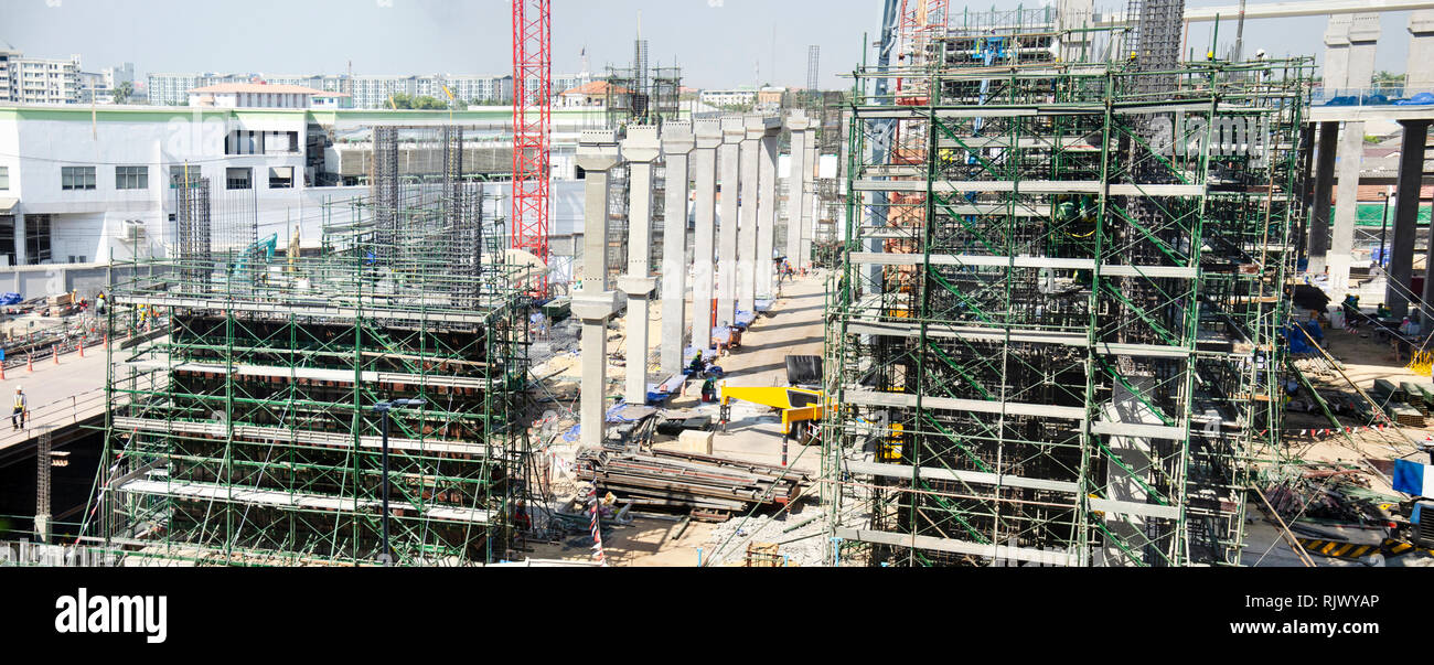 Asian people and thai workers with heavy machinery working builder new ...