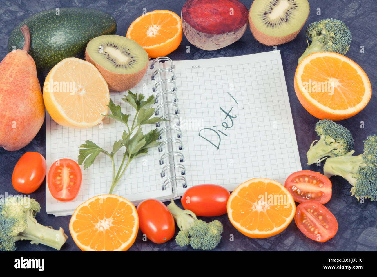 Natural fruits with vegetables as source vitamins and notepad with word ...