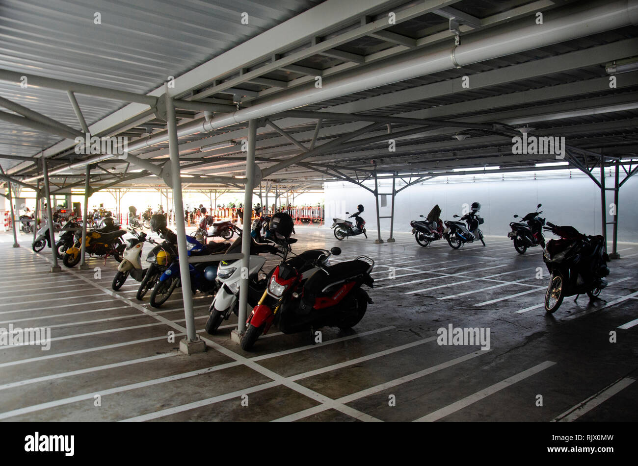 Thai people and travelers ride to stop in motorcycle and bicycle ...