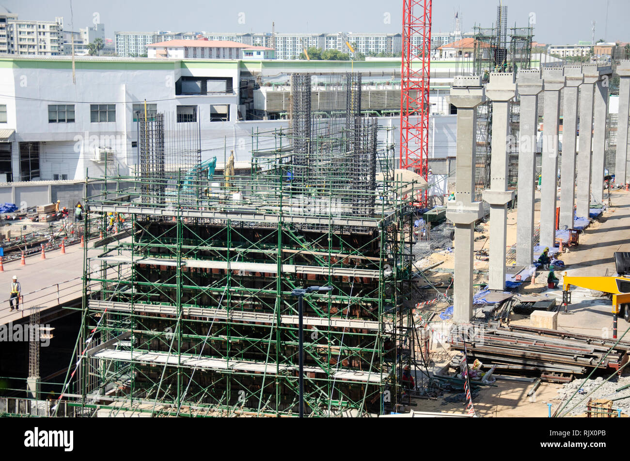 Asian people and thai workers with heavy machinery working builder new ...
