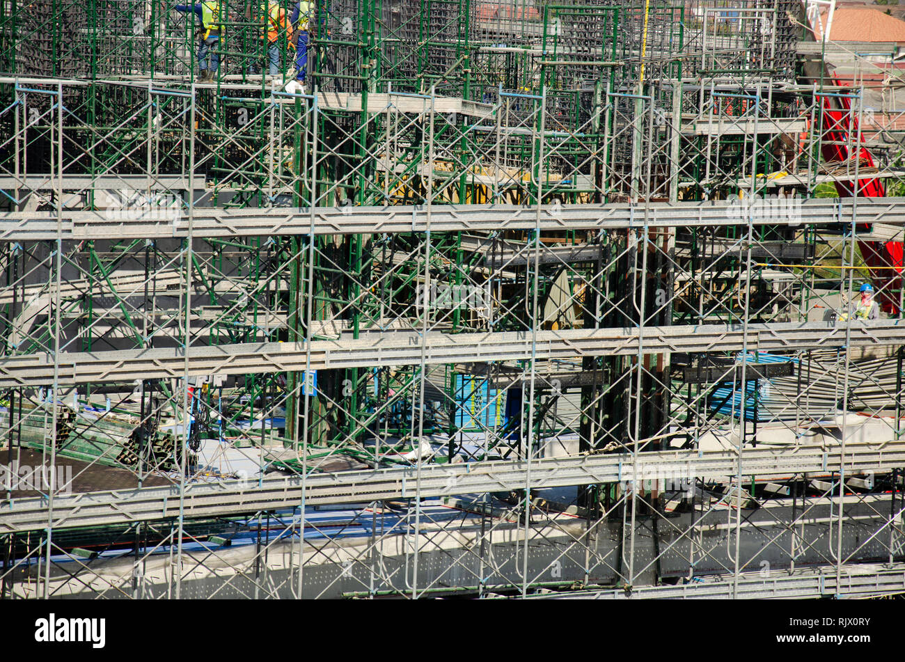 Asian people and thai workers with heavy machinery working builder new ...