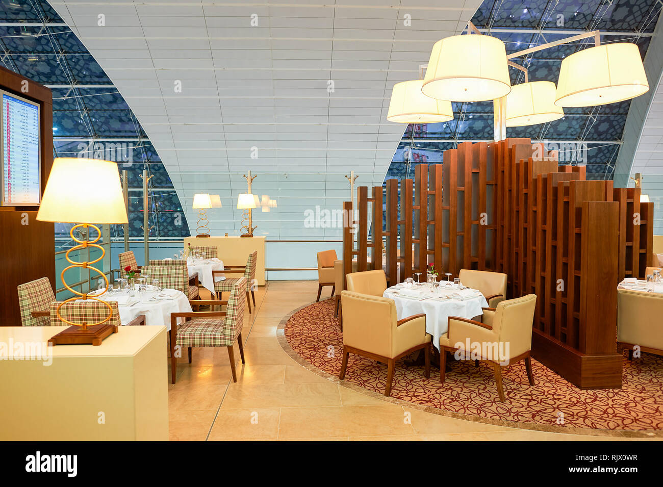 DUBAI, UAE - MARCH 31, 2015: interior of Emirates first class lounge ...