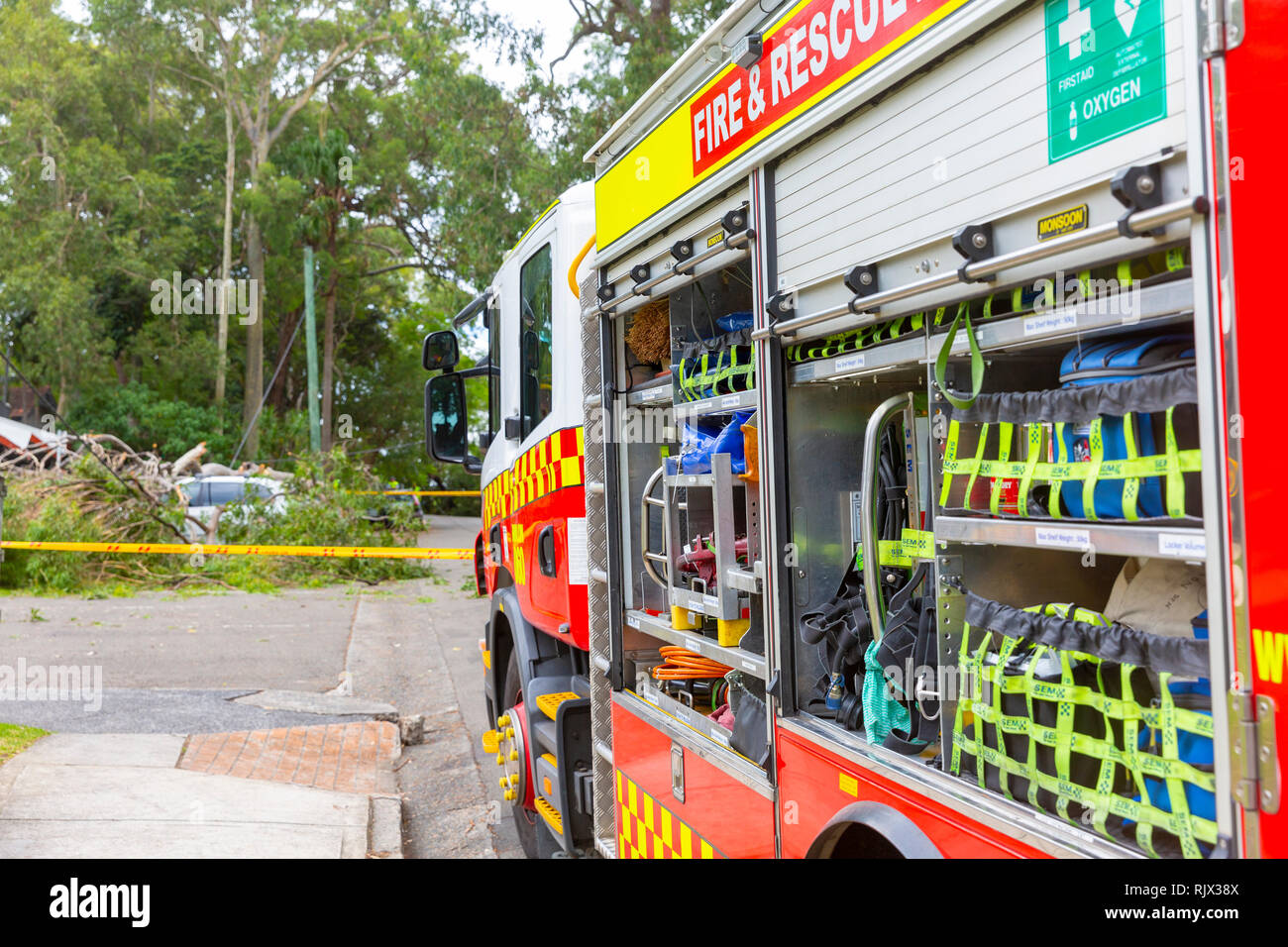 NSW Fire and rescue fire engine attends to a fallen tree in Sydney ...