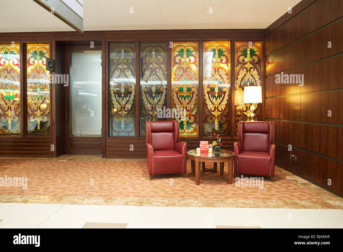 DUBAI, UAE - MARCH 31, 2015: interior of Emirates first class lounge ...