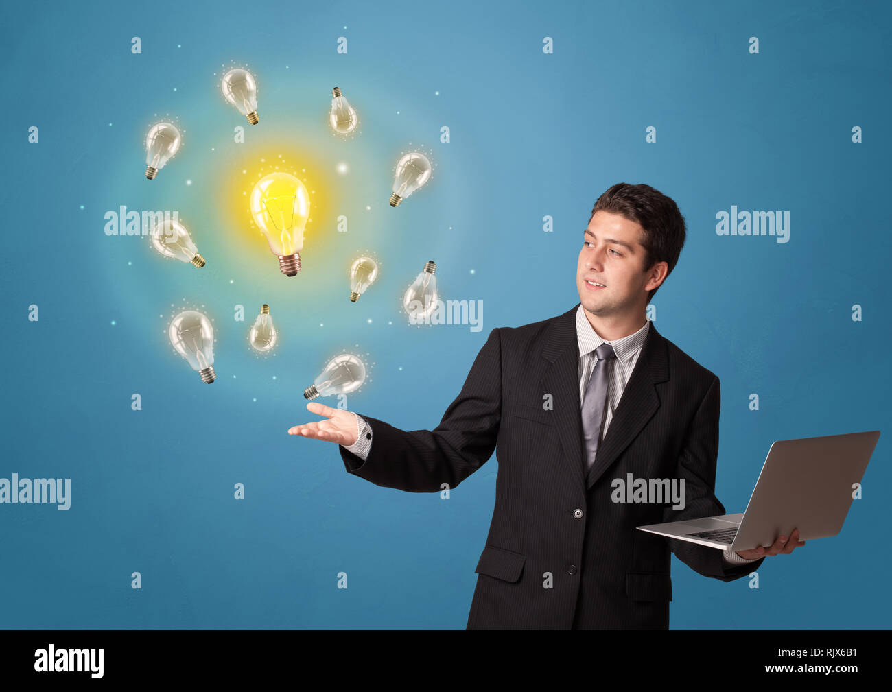 Young smiling person presenting new idea concept Stock Photo - Alamy