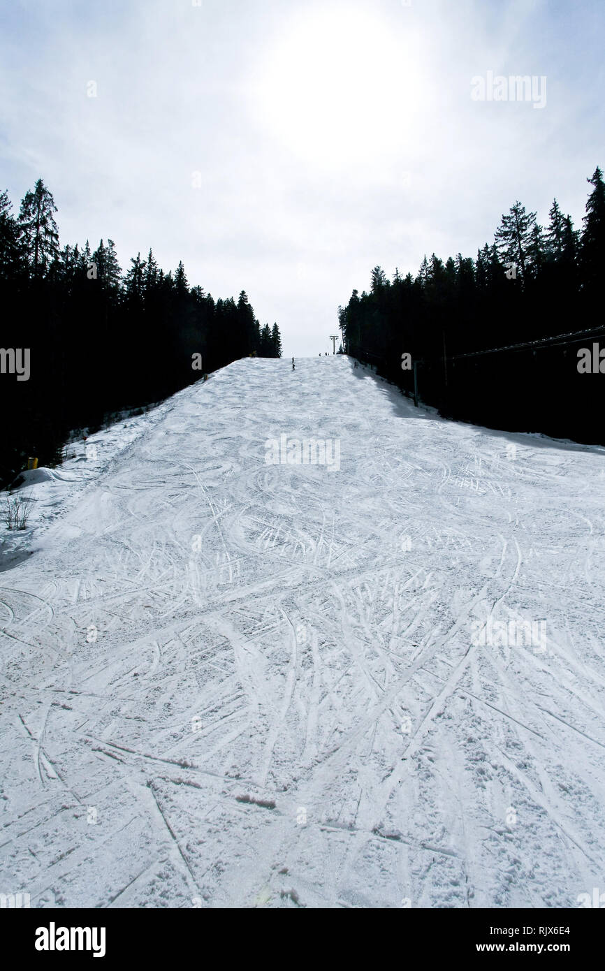 Empty ski slope in a winter resort Stock Photo - Alamy
