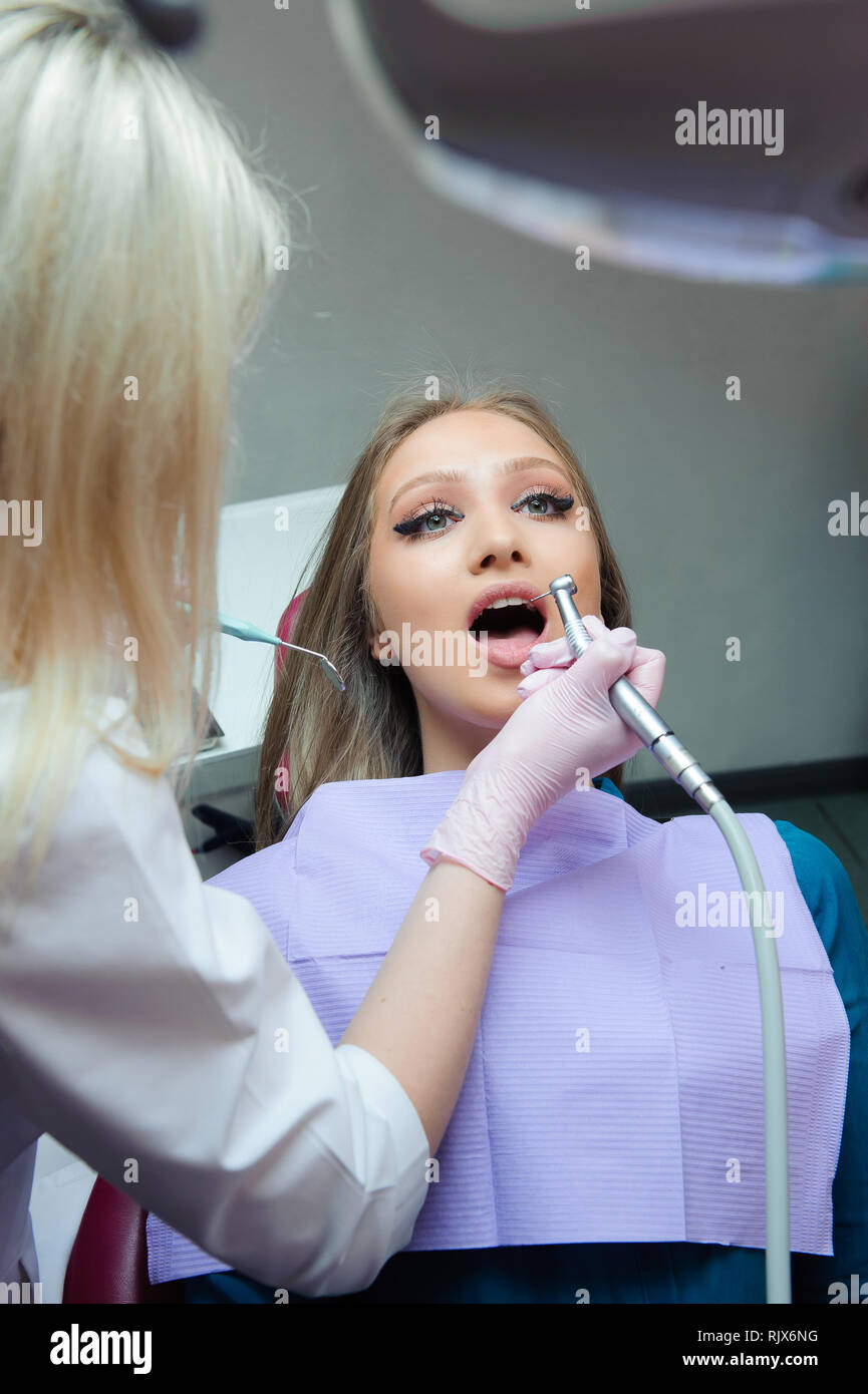 beautiful woman on inspection of the teeth in dentistry Stock Photo - Alamy