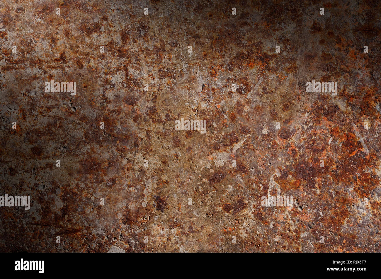 Corroded and rusty surface lit diagonally Stock Photo - Alamy