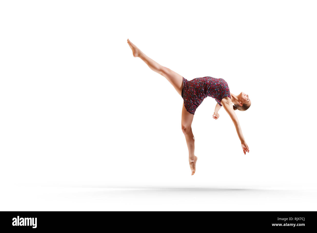 Female dancer ballerina jumping on white background Stock Photo - Alamy