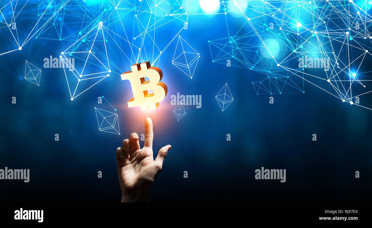 Bitcoin symbol and connection lines in male hand as concept for ...