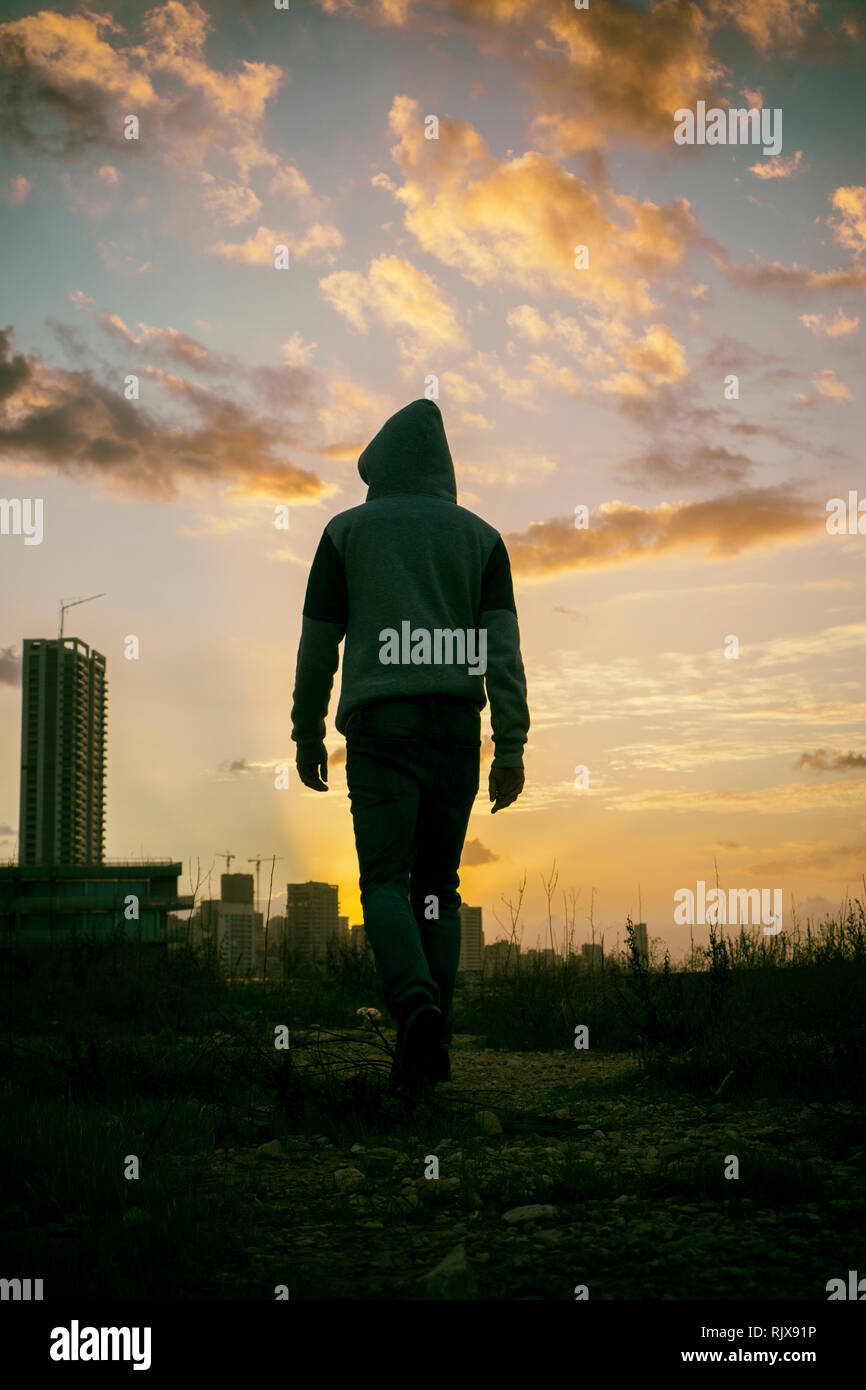 Hooded male hi-res stock photography and images - Alamy