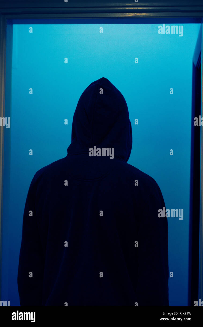 Hooded figure silhouette hi-res stock photography and images - Alamy