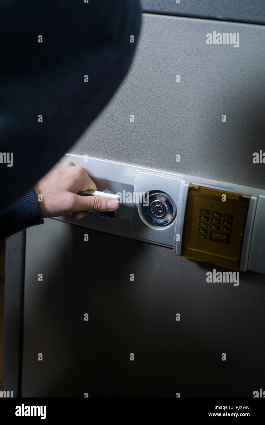 Criminal stealing hi-res stock photography and images - Alamy