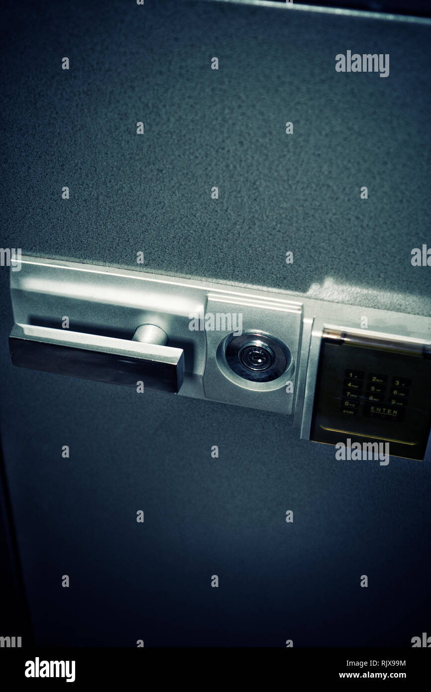 Close up of a modern safe with numbers pad Stock Photo - Alamy
