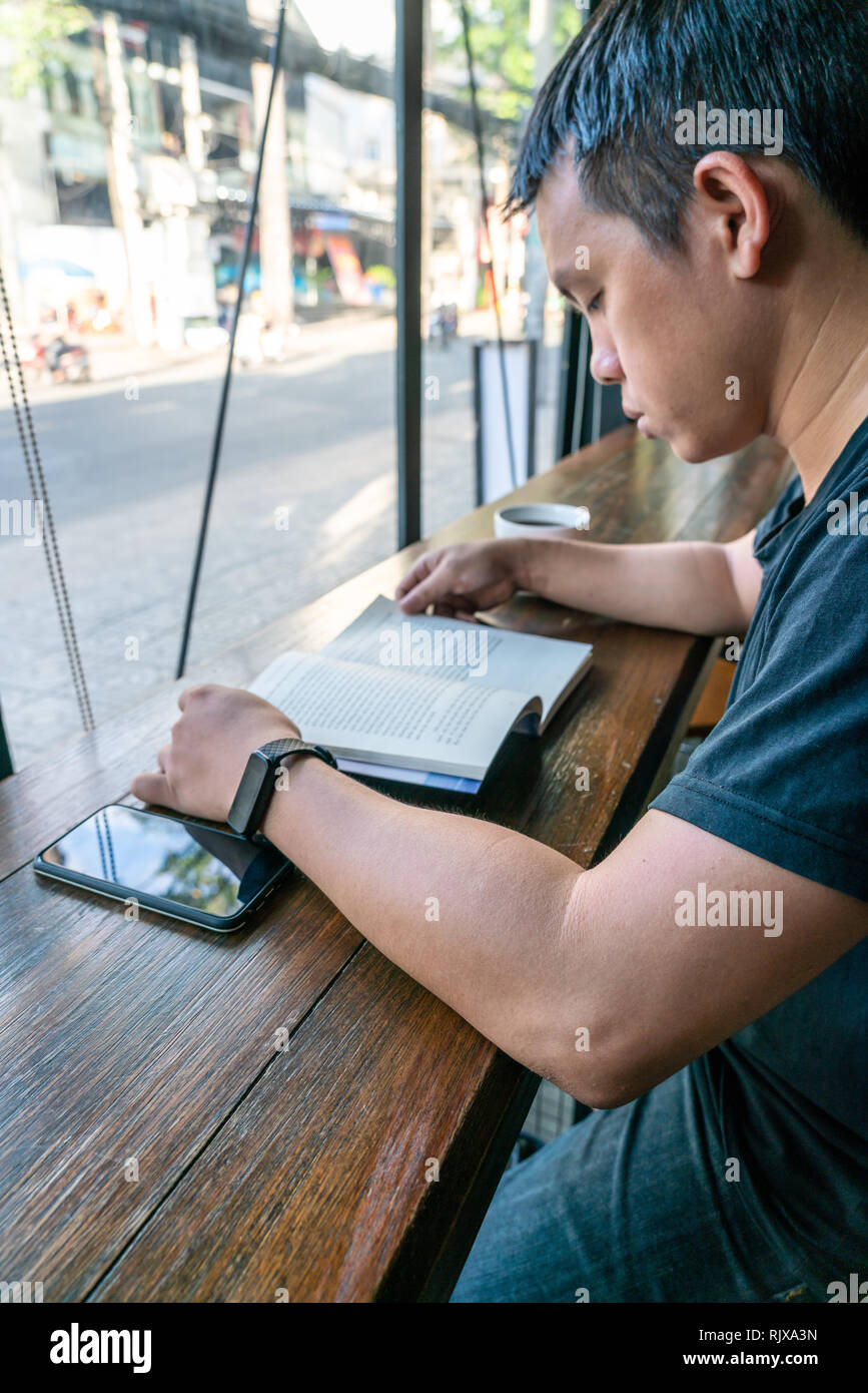 Asian man read hi-res stock photography and images - Alamy