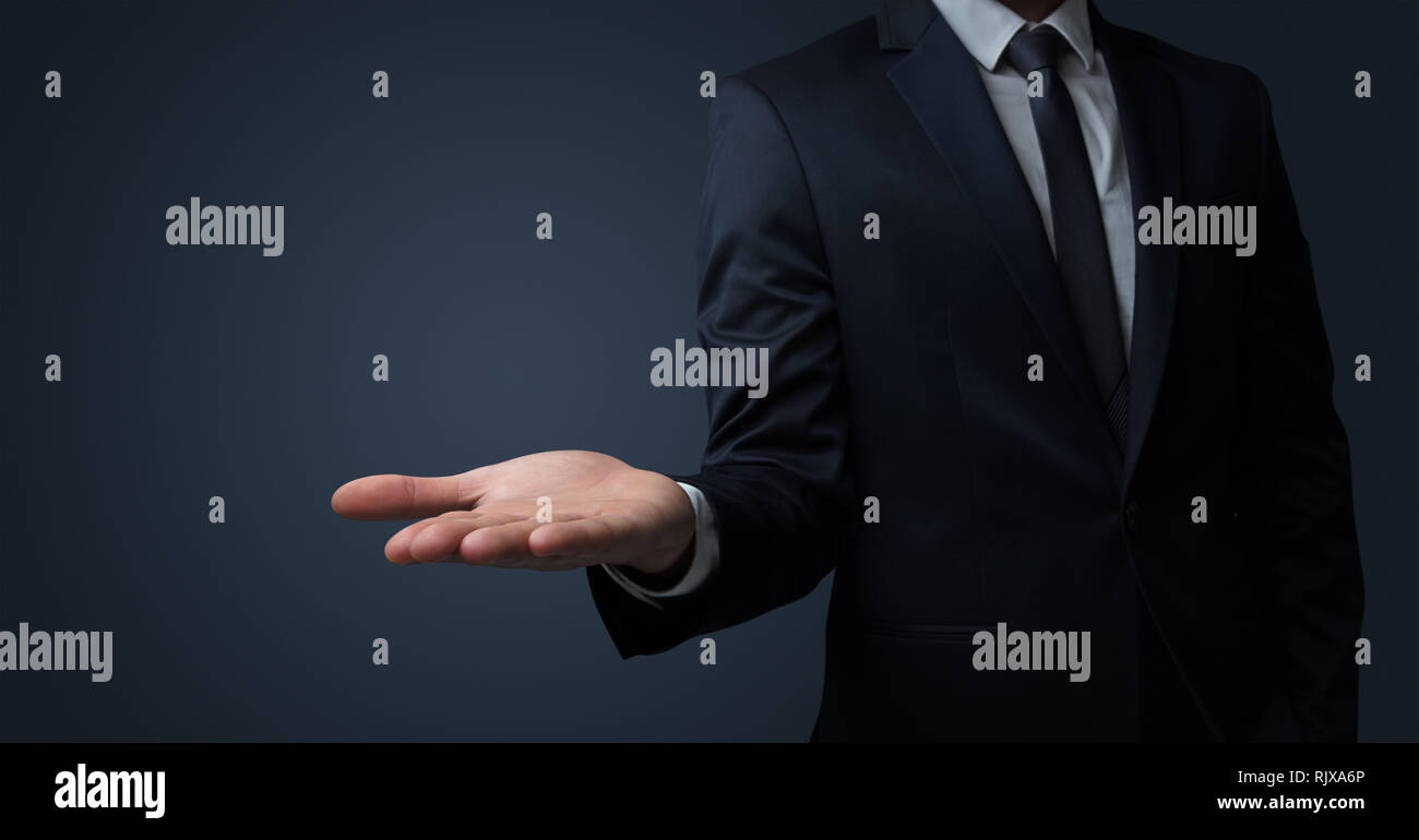 Businessman without head holding something without theme Stock Photo ...