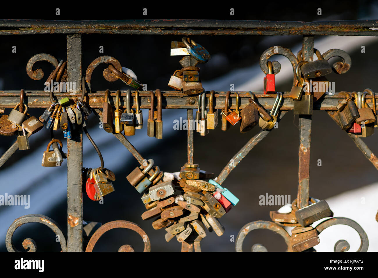 Vintage rustic wedding locks on a metal fencing on bridge Stock Photo ...