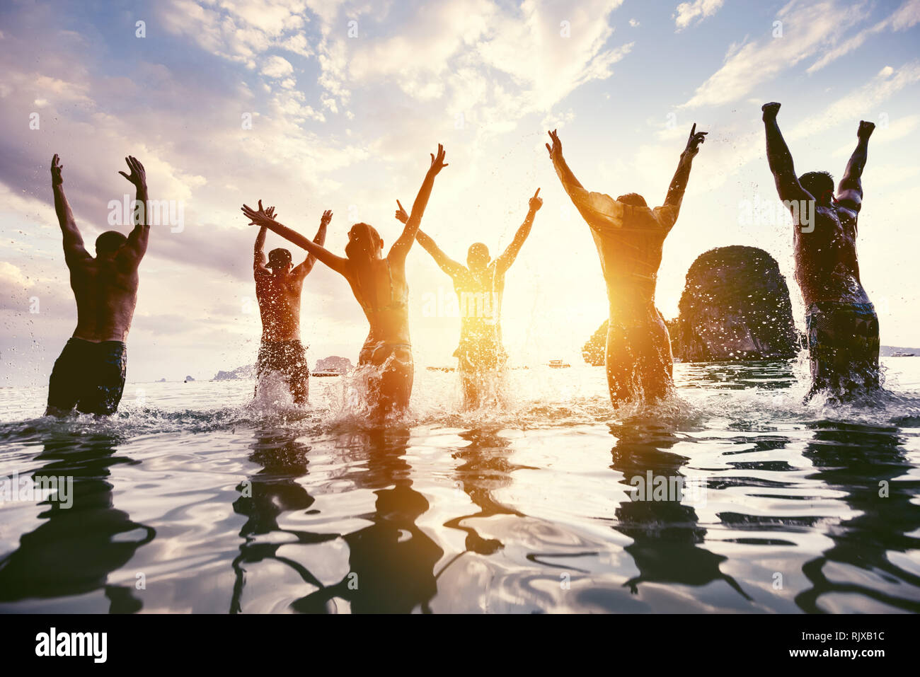 Silhouette people having party beach hi-res stock photography and ...