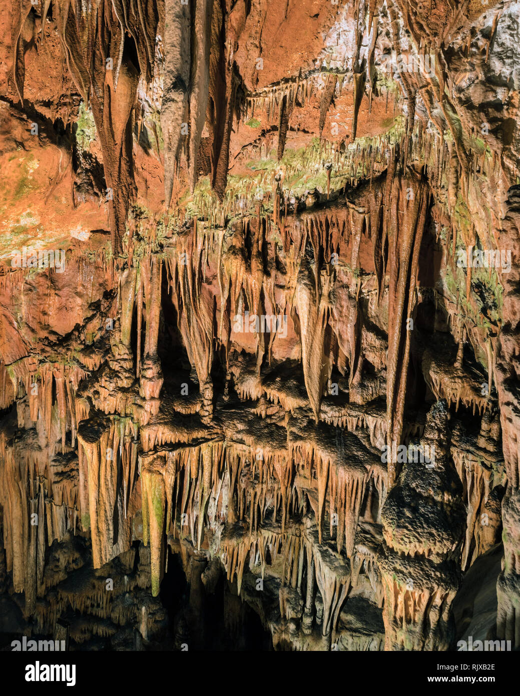 Beautiful cave formations with stalagmites and stalactites deep under ...