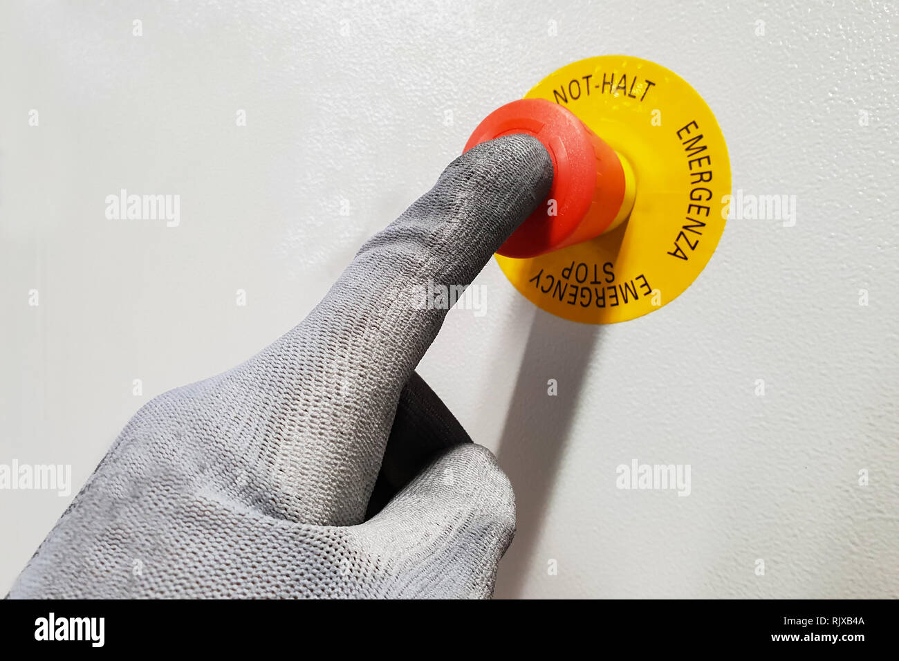 red button / finger on the red button Stock Photo - Alamy