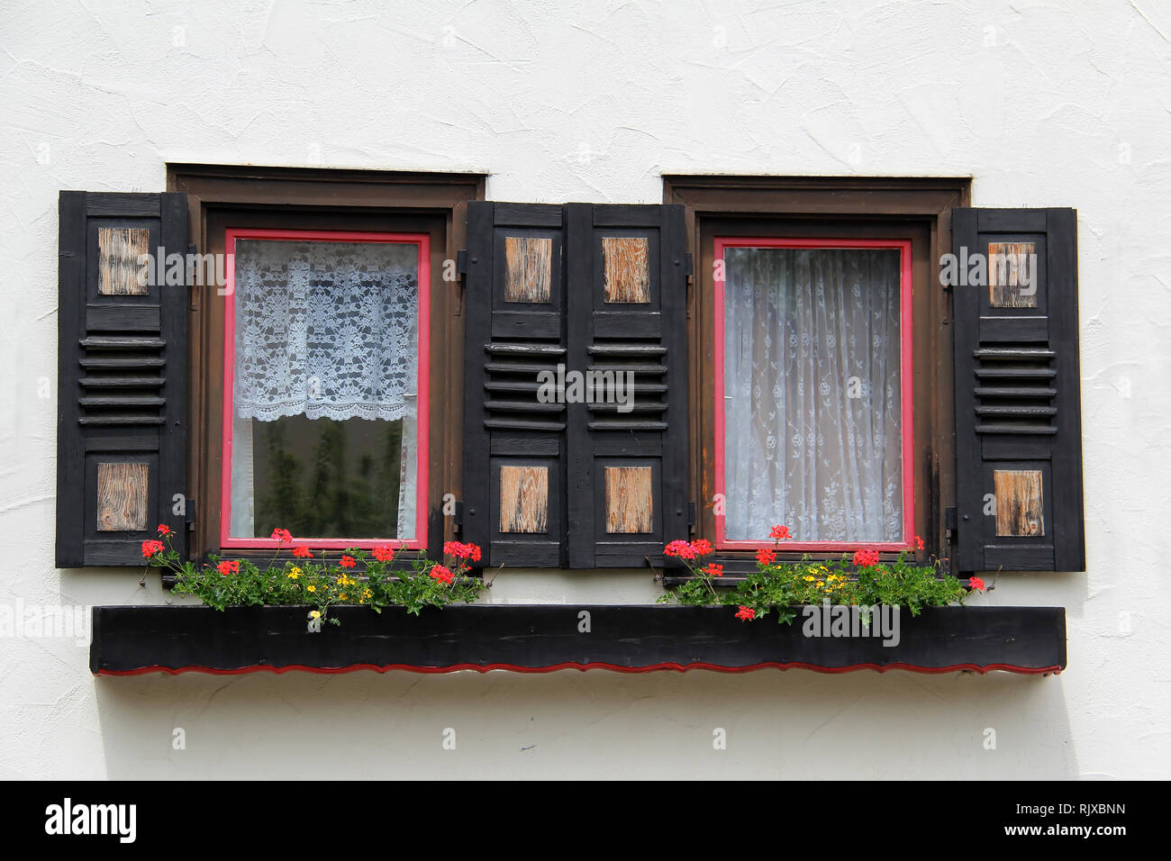 Window with flowers / Window with beautiful flowers on the windowsill ...
