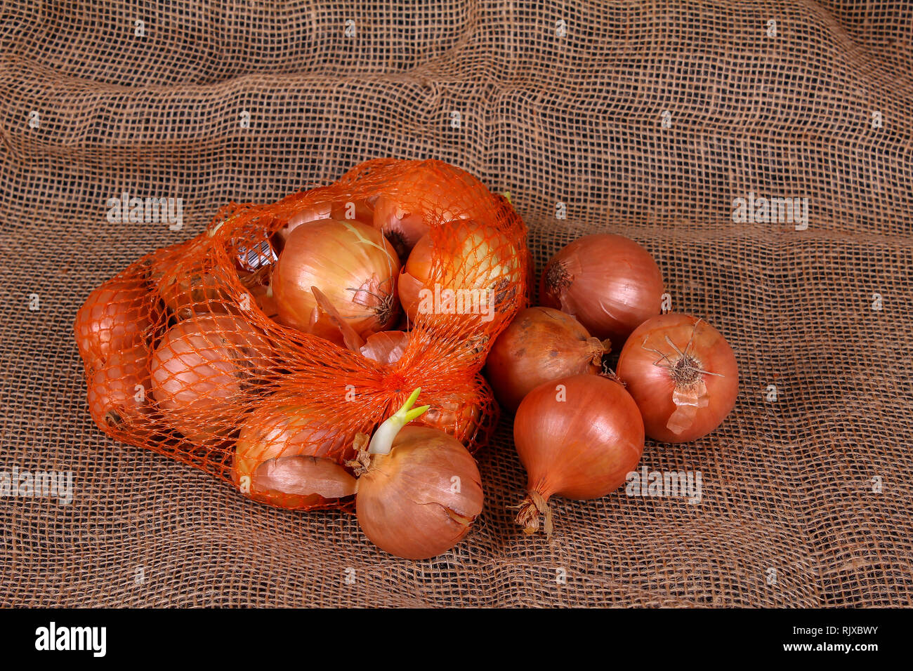 Bag of onions Stock Photo - Alamy