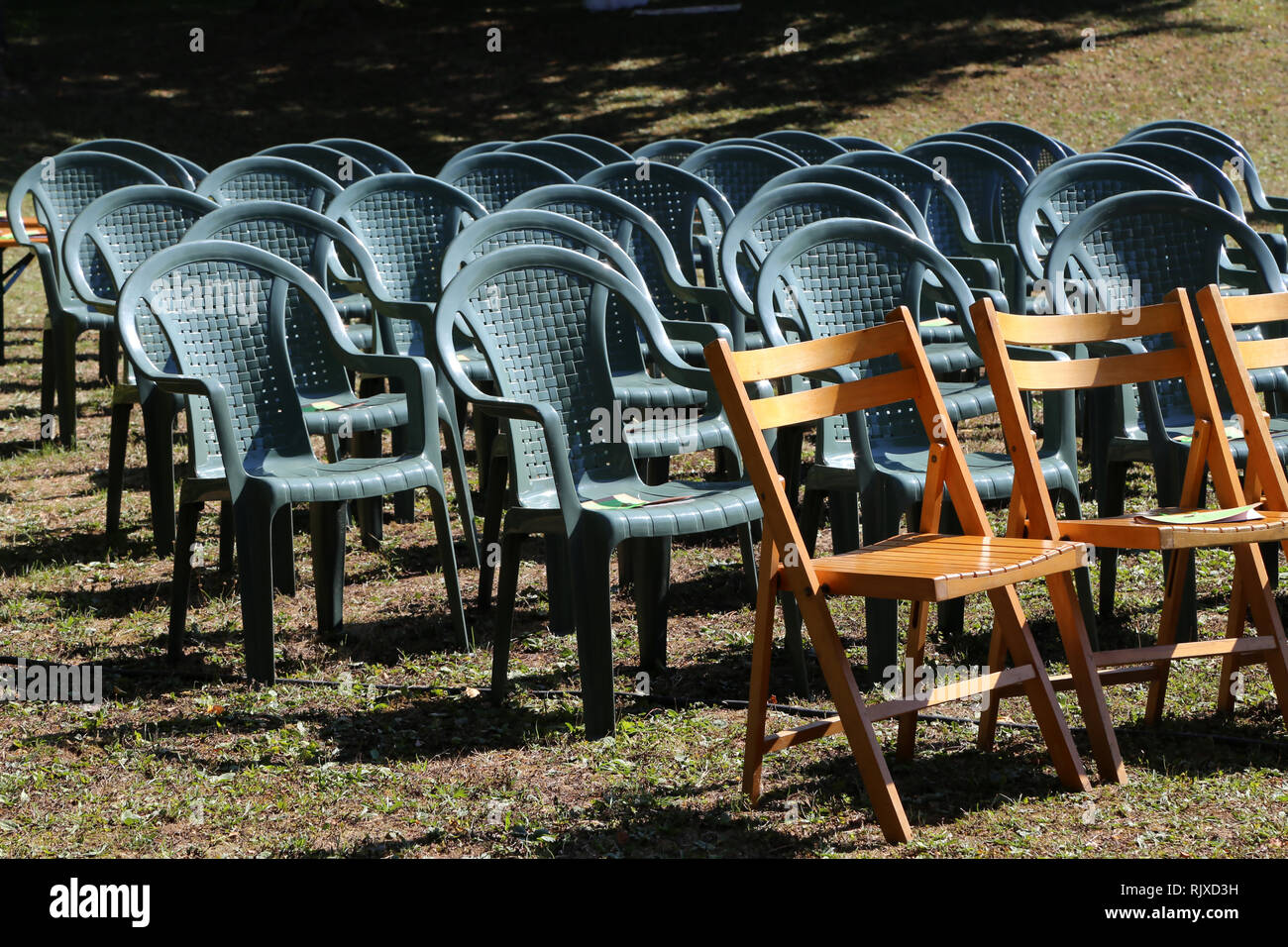 Chairs stand in rows Stock Photo - Alamy