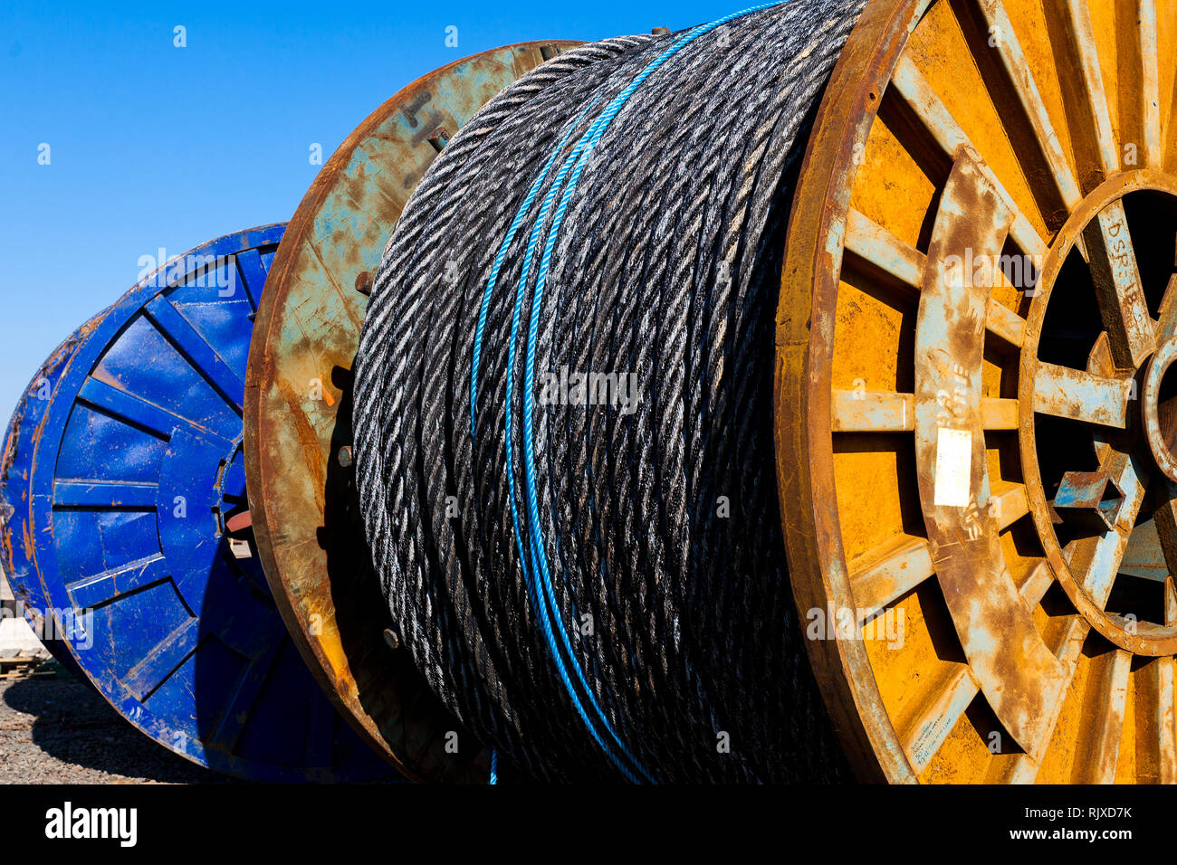 Oil Industry New cable hawsers round drums stored Montrose Quayside UK ...