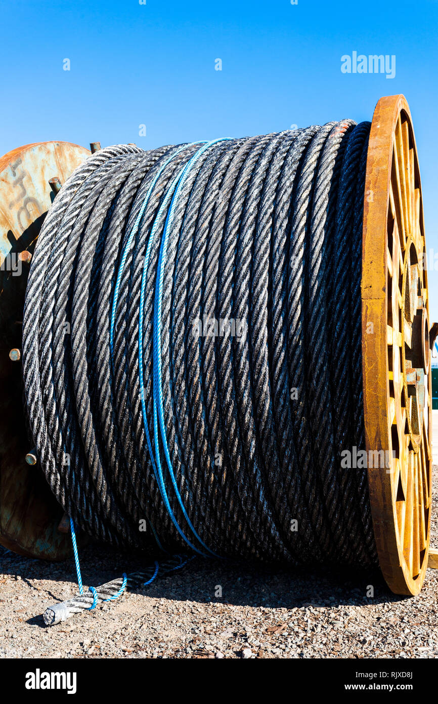 Oil Industry New cable hawsers round drums stored Montrose Quayside UK ...