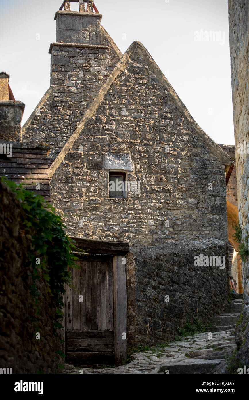 Typical French townscape with ancient housest and cobblestone street in ...
