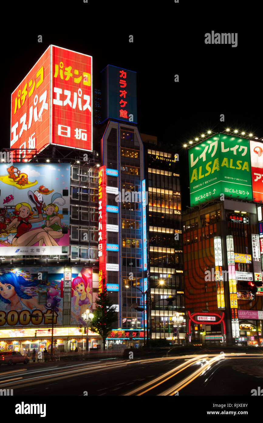 Neon signs on modern highrise buildings in Kabukicho, a centre of ...
