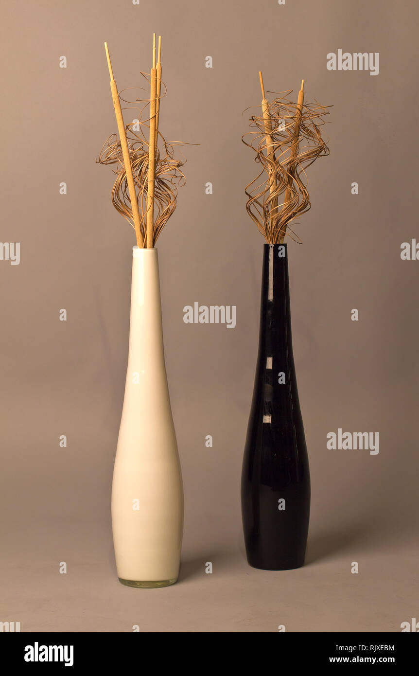 Still life with glass vases and twigs of willow Stock Photo - Alamy