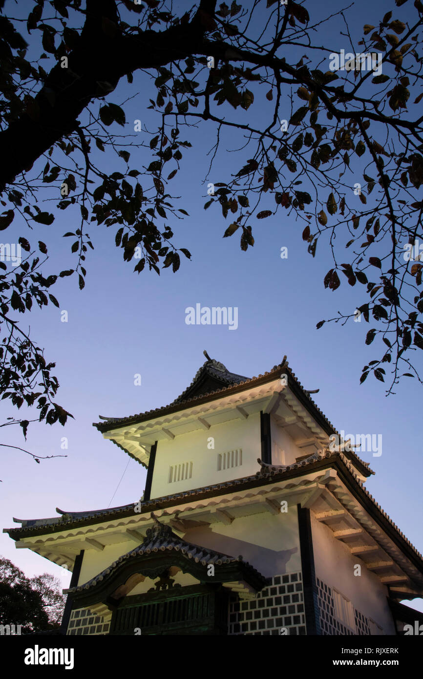 An entrance gate to the grounds of Kanazawa castle at dusk. Kanazawa ...