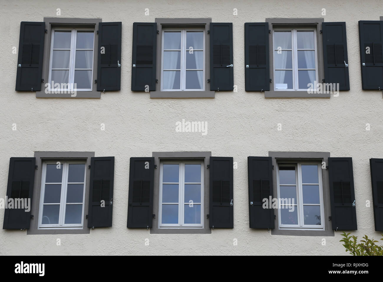 Windows in a high-rise building Stock Photo - Alamy