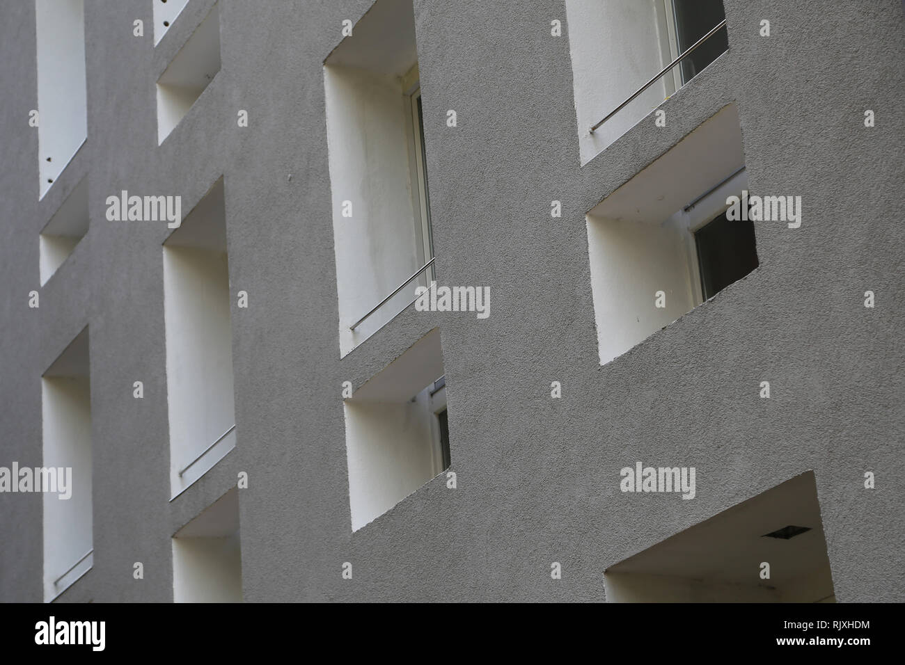 Windows in a high-rise building Stock Photo - Alamy