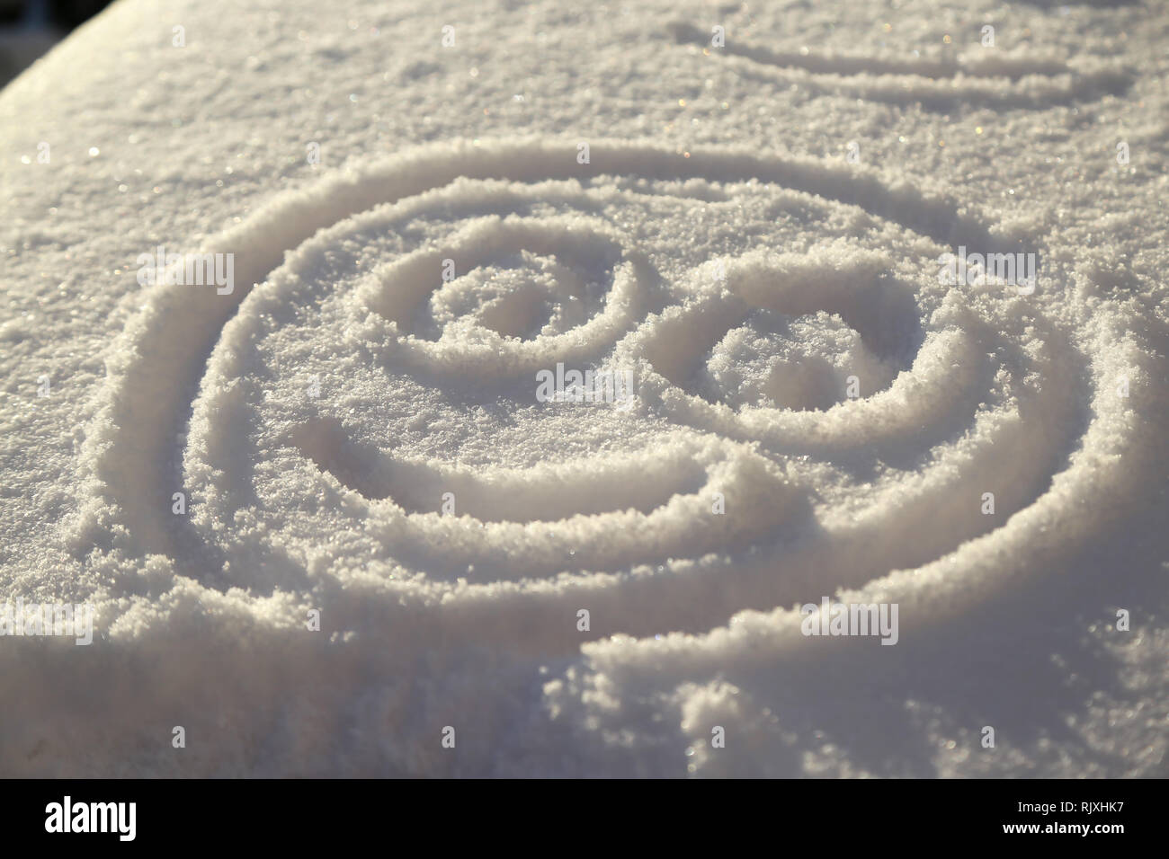 Winter / A face in the snow Stock Photo - Alamy