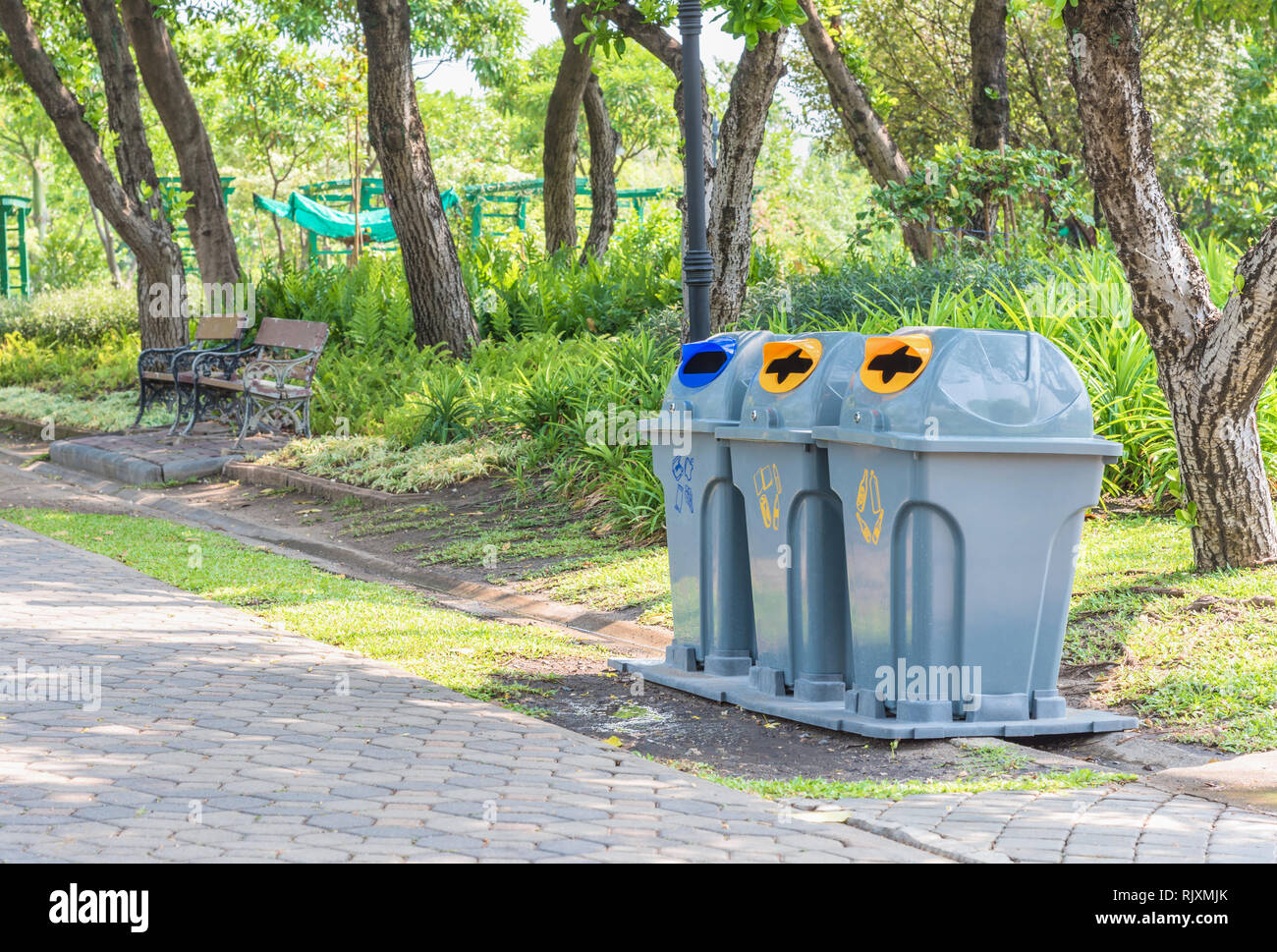 Different Colored Bins For Collection Of Recycle Materials Stock Photo ...