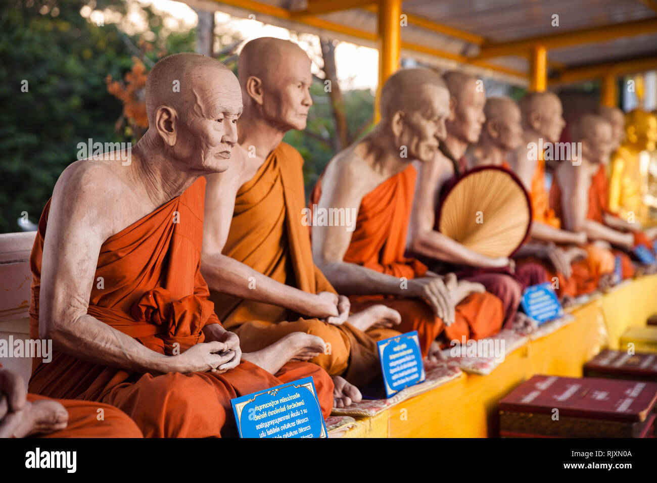 Realistic statues of buddhist monks in Thailand temple in Chiang Mai ...