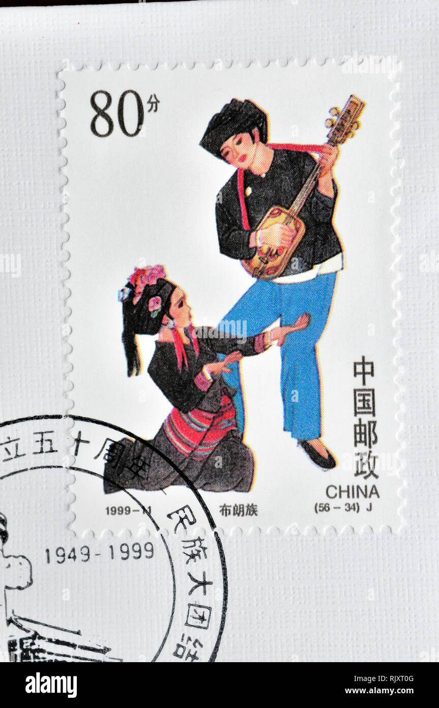 CHINA - CIRCA 1999: A stamp printed in China shows 1999-11 Unity of Ethinc 56 Groups - Marking ...