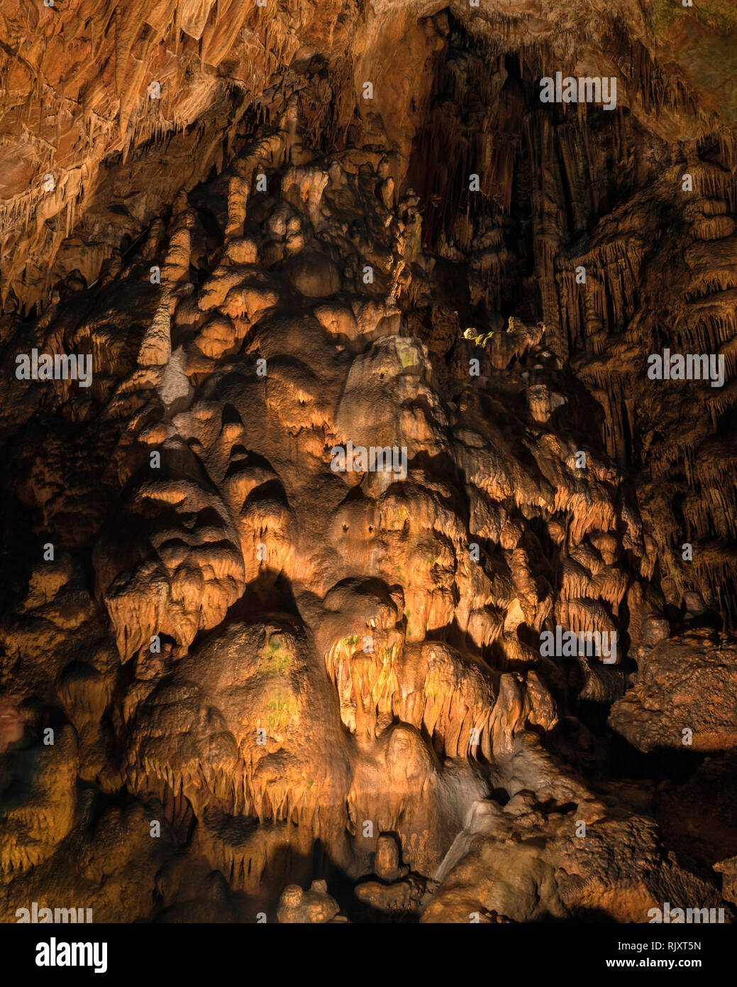 Beautiful cave formations with stalagmites and stalactites deep under ...