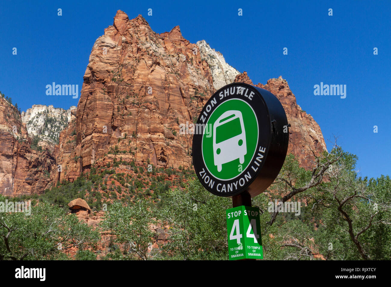 Jacob Peak, part of the Court of the Patriarchs behind a shuttle bus ...