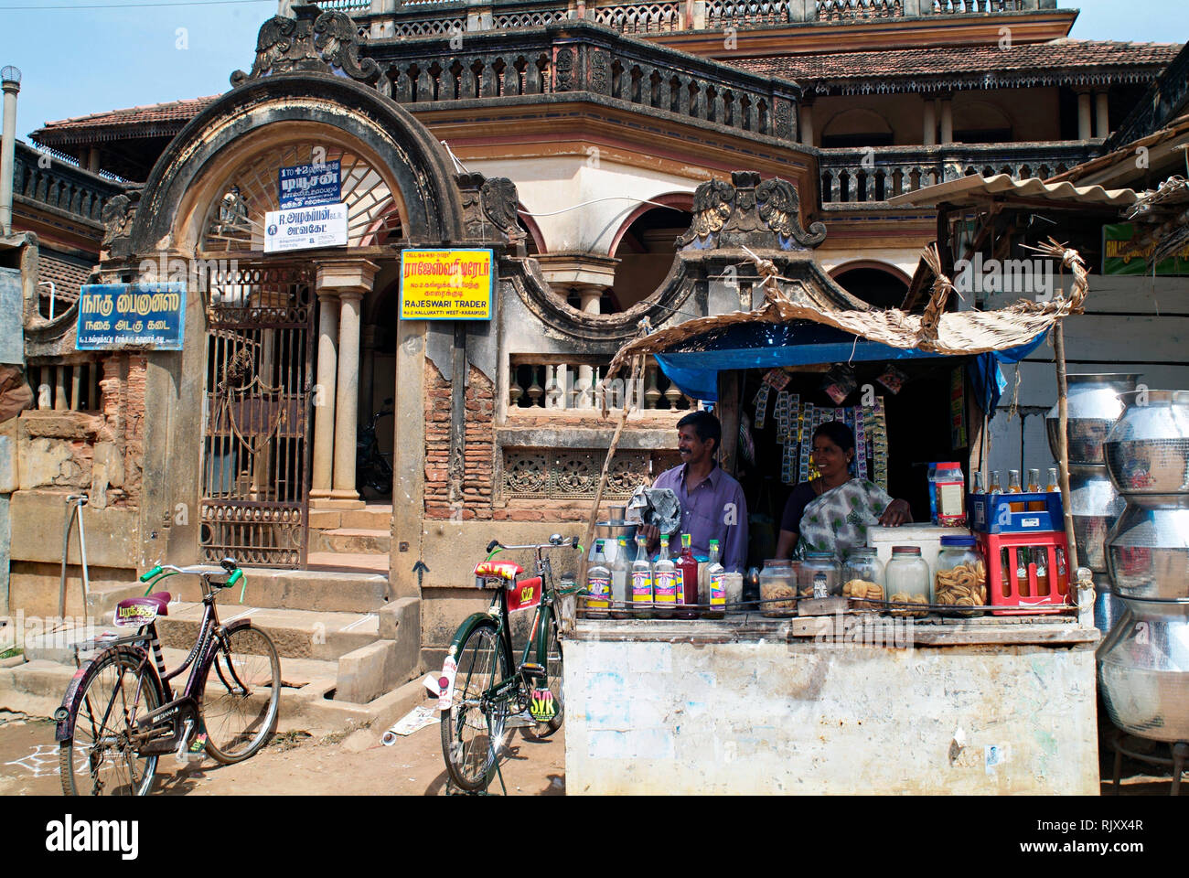 A chaat and betel stand outside the gates of an abandoned mansion in ...
