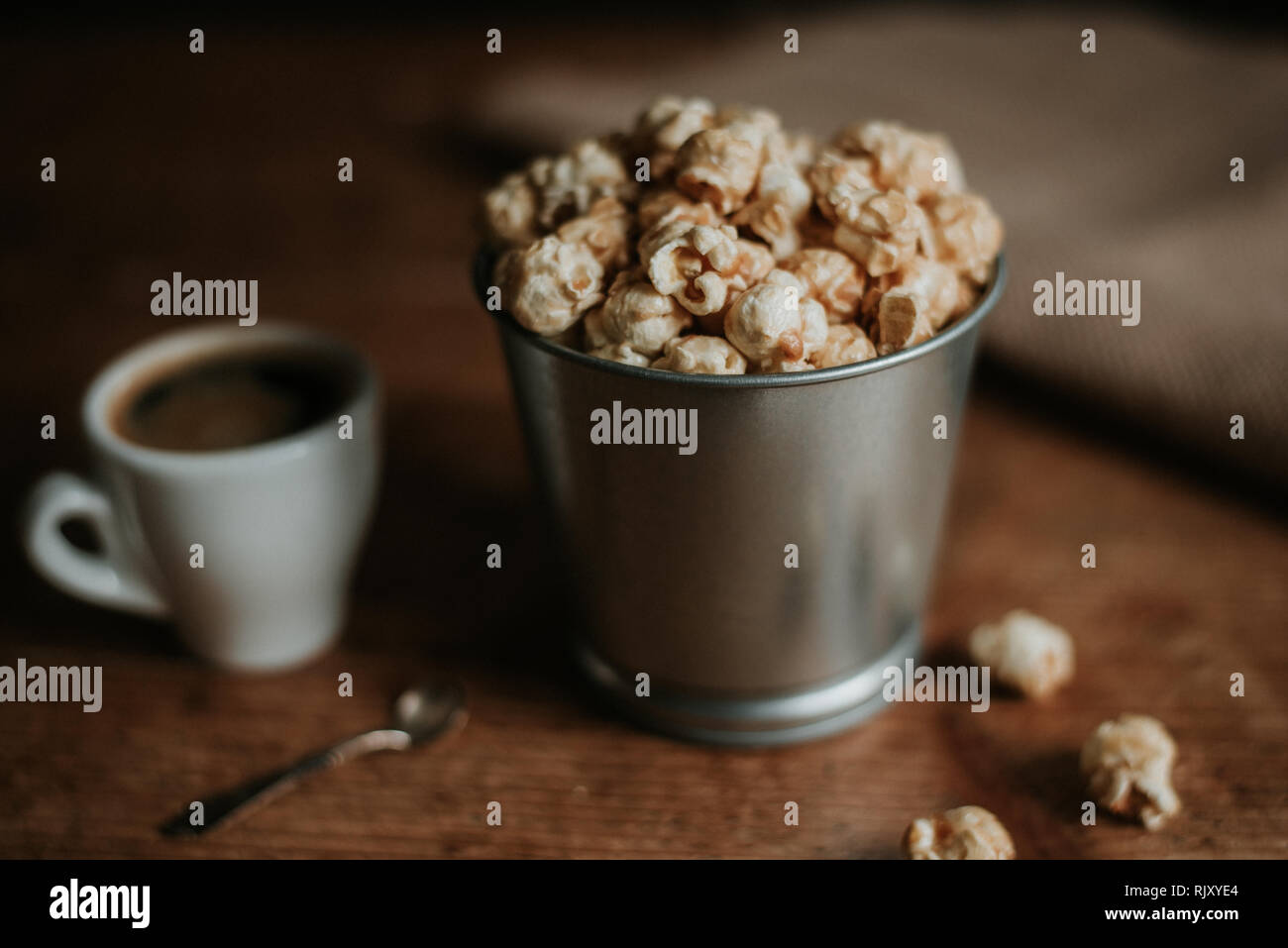 Espresso coffee and popcorn Stock Photo - Alamy