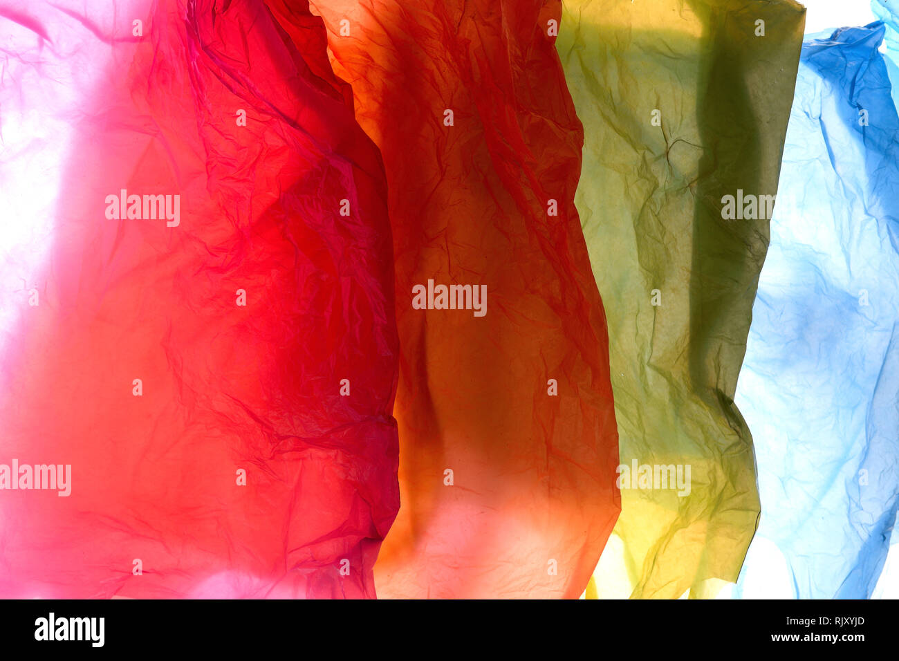 plastic bags of used and transparent colors Stock Photo - Alamy