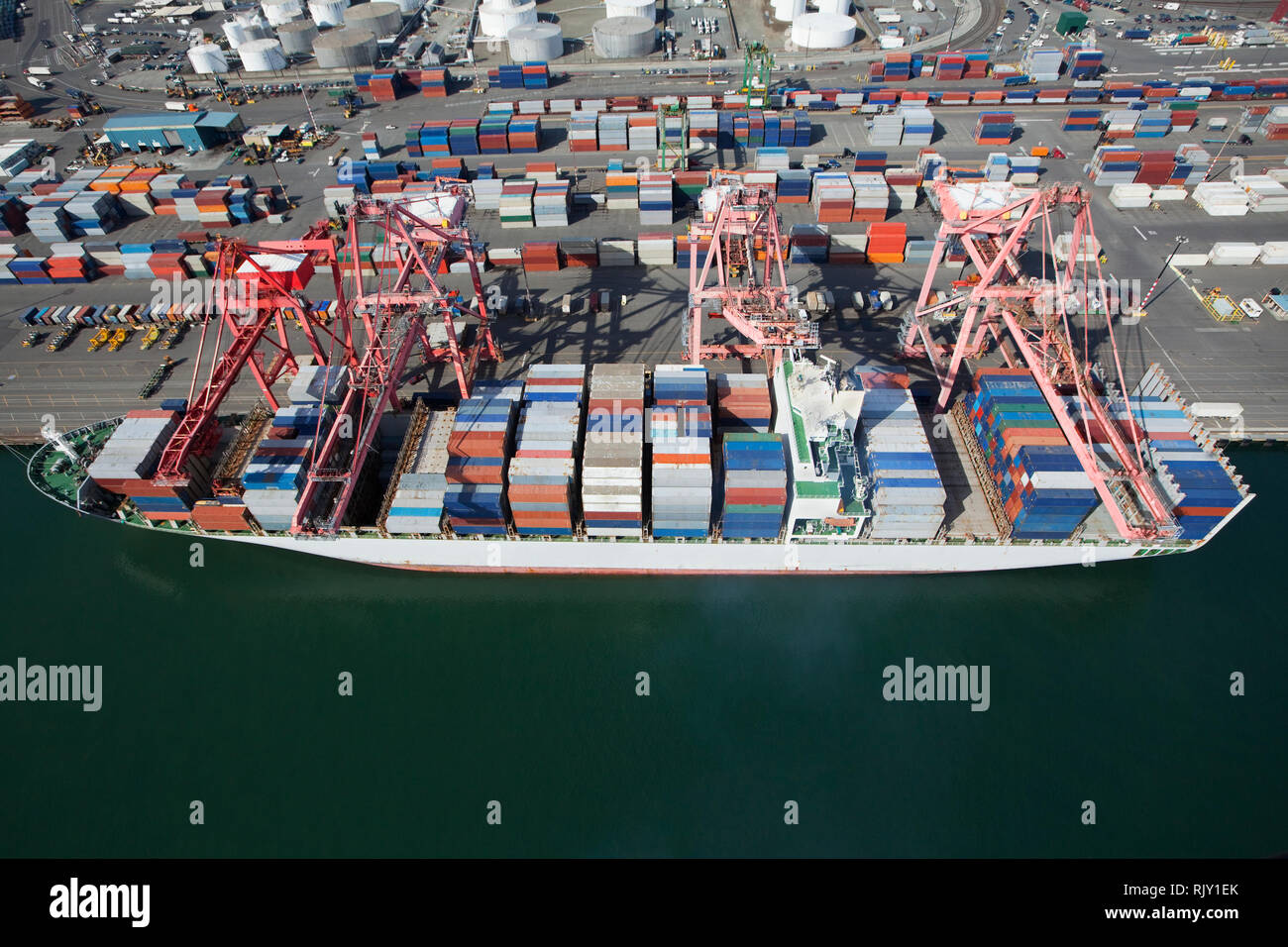 Cargo containers on commercial dock Stock Photo - Alamy