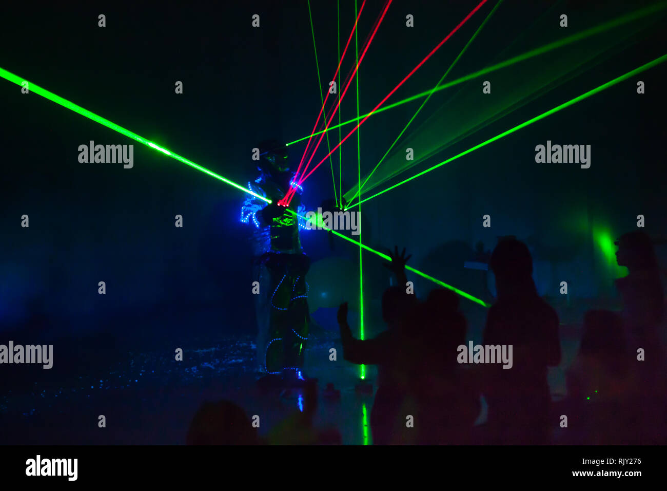 Colorful lights show. Laser show in motion in dark Stock Photo - Alamy