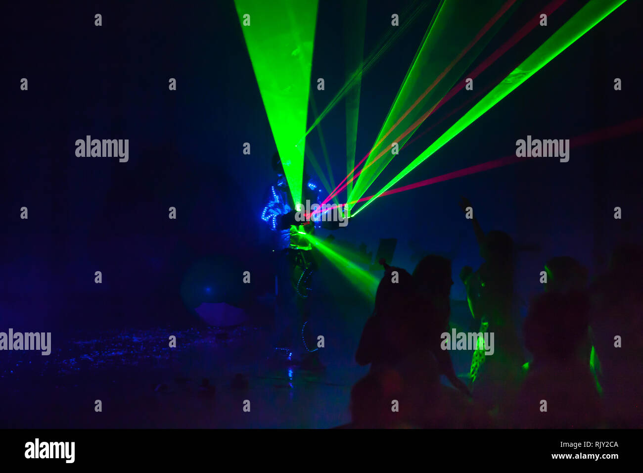 Colorful lights show. Laser show in motion in dark Stock Photo - Alamy