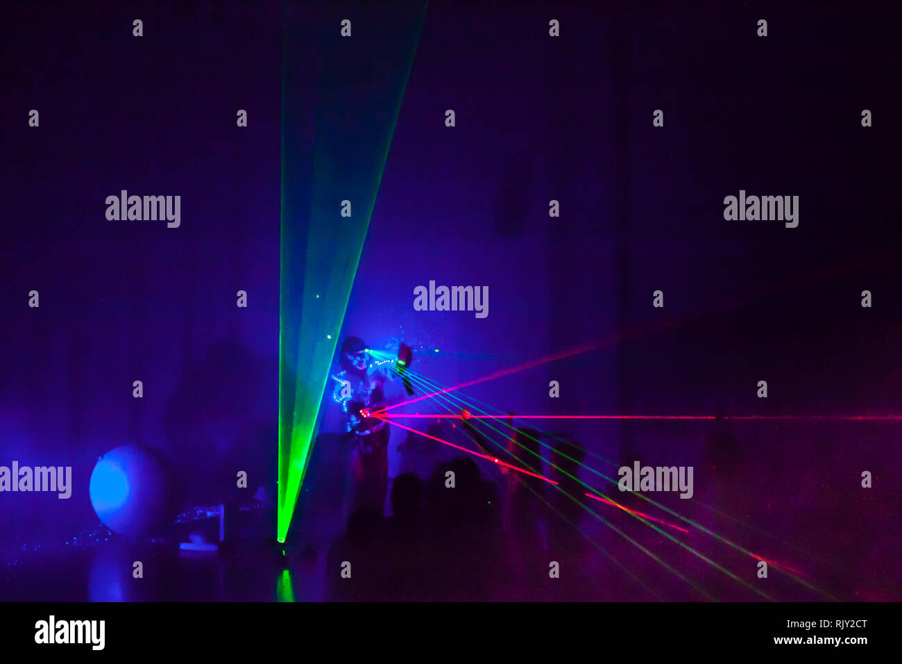 Colorful lights show. Laser show in motion in dark Stock Photo - Alamy