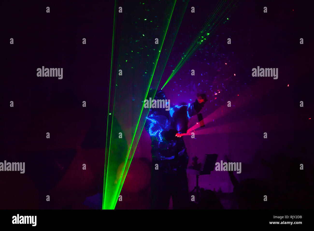 Colorful lights show. Laser show in motion in dark Stock Photo - Alamy